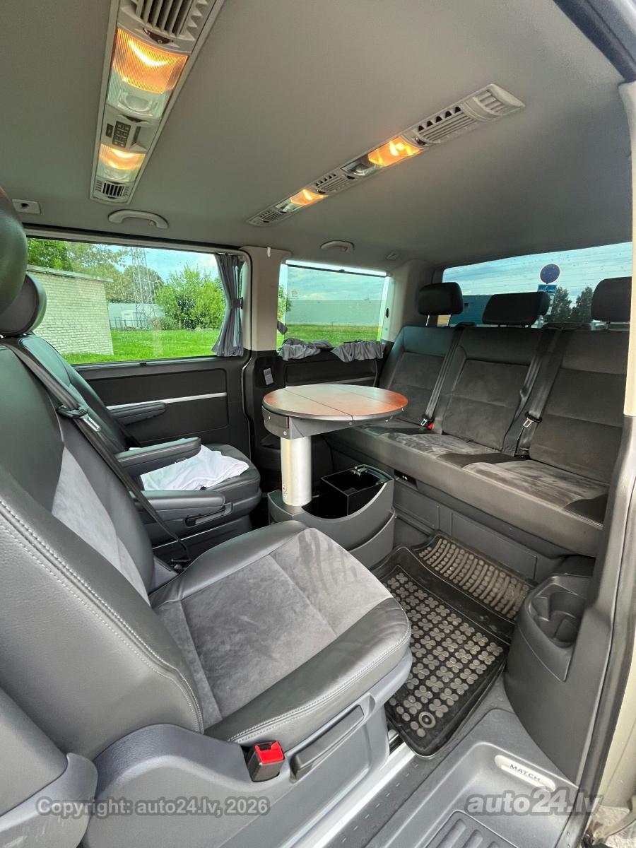 Beige Volkswagen Multivan 2012 in Tallinn, with an engine capacity of 2.00 L and mileage of 247 thousand km for 17200 €, photo 13 on AUTOMOTO.COM.LV