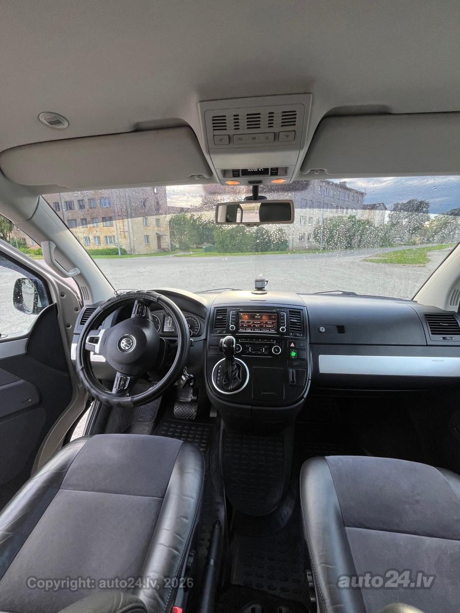 Beige Volkswagen Multivan 2012 in Tallinn, with an engine capacity of 2.00 L and mileage of 247 thousand km for 17200 €, photo 15 on AUTOMOTO.COM.LV