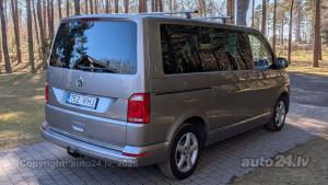 Beige Volkswagen Multivan 2016 in Haapsalu, with an engine capacity of 2.00 L and mileage of 204 thousand km for 27900 €, photo 5 on AUTOMOTO.COM.LV