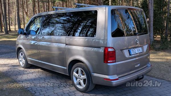 Beige Volkswagen Multivan 2016 in Haapsalu, with an engine capacity of 2.00 L and mileage of 204 thousand km for 27900 €, photo 6 on AUTOMOTO.COM.LV