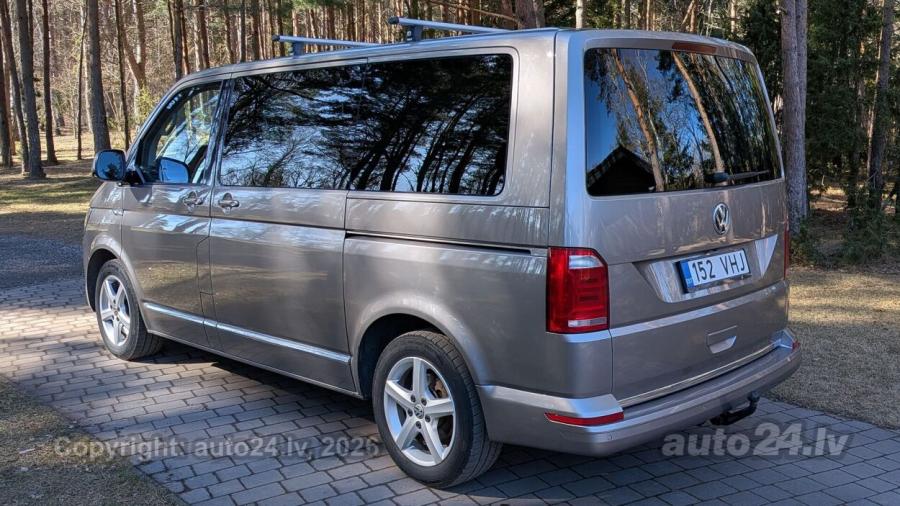 Beige Volkswagen Multivan 2016 in Haapsalu, with an engine capacity of 2.00 L and mileage of 204 thousand km for 27900 €, photo 7 on AUTOMOTO.COM.LV
