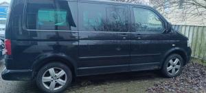 Black Volkswagen Multivan 2005 in Utena, with an engine capacity of 2.50 L and mileage of 250 thousand km for 6390 €, photo 4 on AUTOMOTO.COM.LV