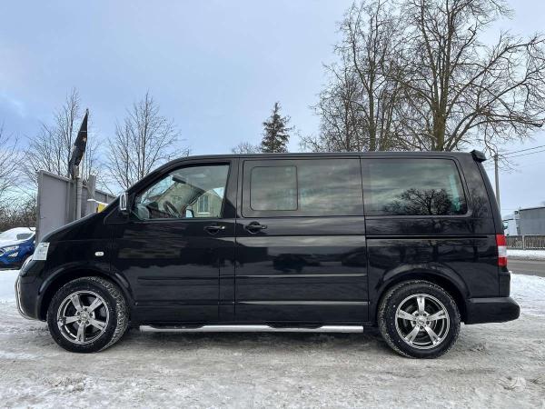 Black Volkswagen Multivan 2007 in Siauliai, with an engine capacity of 2.50 L and mileage of 294 thousand km for 9250 €, photo 7 on AUTOMOTO.COM.LV