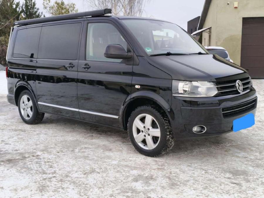 Black Volkswagen Multivan 2010 in Kedainiai, with an engine capacity of 1.97 L and mileage of 266 thousand km for 15900 €, photo 2 on AUTOMOTO.COM.LV