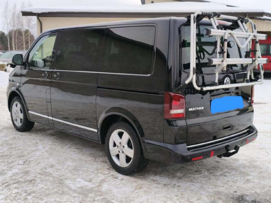 Black Volkswagen Multivan 2010 in Kedainiai, with an engine capacity of 1.97 L and mileage of 266 thousand km for 15900 €, photo 8 on AUTOMOTO.COM.LV