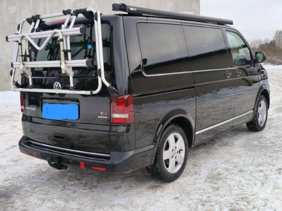 Black Volkswagen Multivan 2010 in Kedainiai, with an engine capacity of 1.97 L and mileage of 266 thousand km for 15900 €, photo 12 on AUTOMOTO.COM.LV