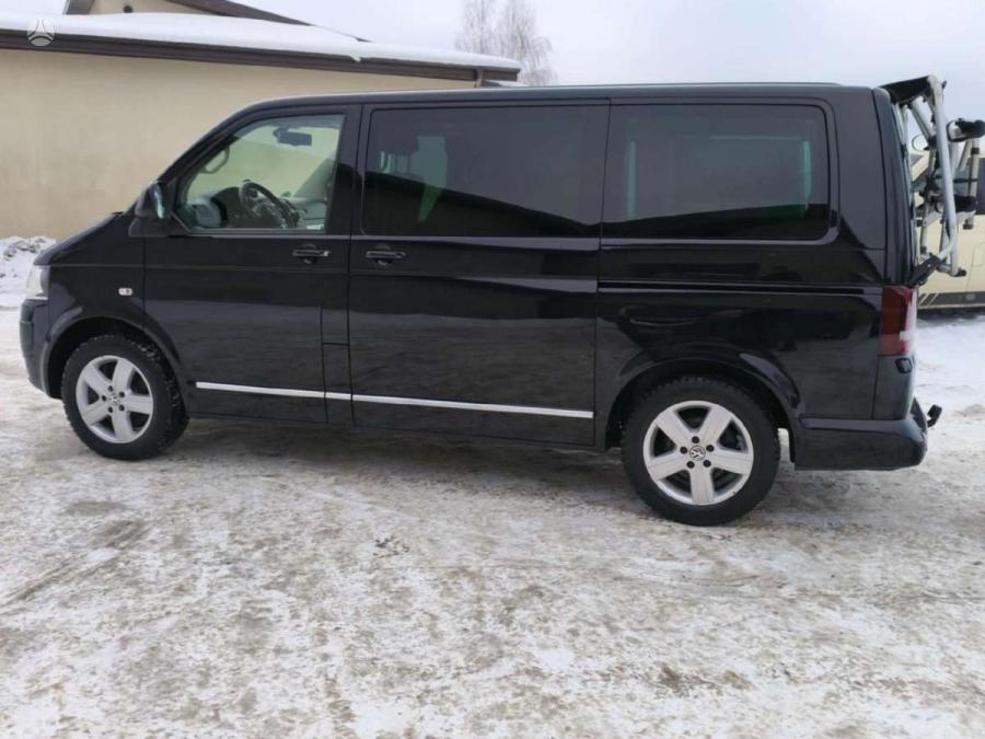 Black Volkswagen Multivan 2010 in Kedainiai, with an engine capacity of 1.97 L and mileage of 266 thousand km for 15900 €, photo 14 on AUTOMOTO.COM.LV