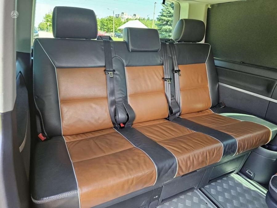 Black Volkswagen Multivan 2010 in Kedainiai, with an engine capacity of 2.00 L and mileage of 273 thousand km for 14900 €, photo 14 on AUTOMOTO.COM.LV