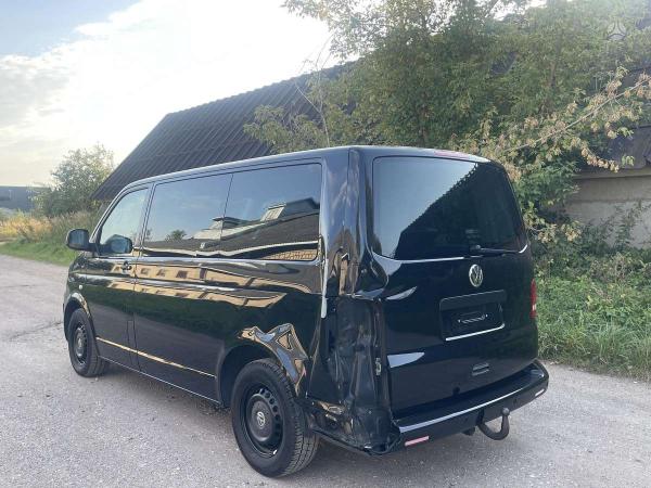 Black Volkswagen Multivan 2010 in Kaunas, with an engine capacity of 1.97 L and mileage of 276 thousand km for 9990 €, photo 3 on AUTOMOTO.COM.LV