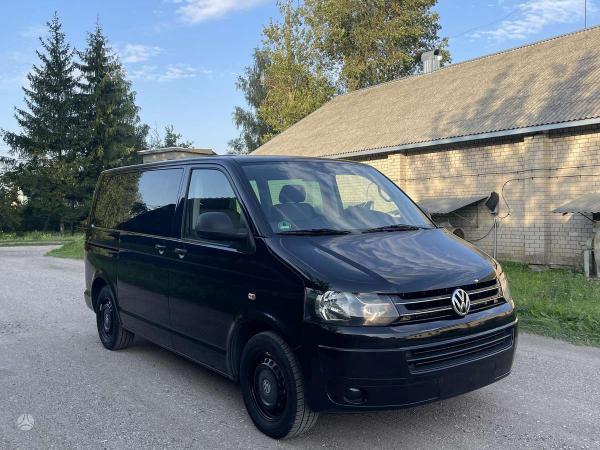 Black Volkswagen Multivan 2010 in Kaunas, with an engine capacity of 1.97 L and mileage of 276 thousand km for 9990 €, photo 6 on AUTOMOTO.COM.LV