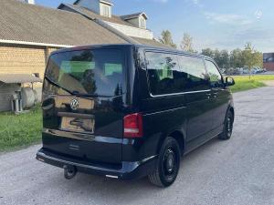 Black Volkswagen Multivan 2010 in Kaunas, with an engine capacity of 1.97 L and mileage of 276 thousand km for 9990 €, photo 7 on AUTOMOTO.COM.LV