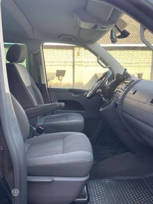 Black Volkswagen Multivan 2010 in Kaunas, with an engine capacity of 1.97 L and mileage of 276 thousand km for 9990 €, photo 18 on AUTOMOTO.COM.LV