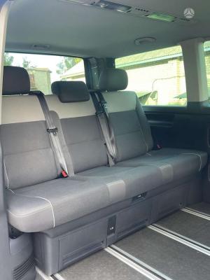 Black Volkswagen Multivan 2010 in Kaunas, with an engine capacity of 1.97 L and mileage of 276 thousand km for 9990 €, photo 19 on AUTOMOTO.COM.LV