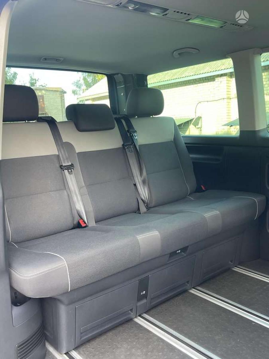 Black Volkswagen Multivan 2010 in Kaunas, with an engine capacity of 1.97 L and mileage of 276 thousand km for 9990 €, photo 19 on AUTOMOTO.COM.LV