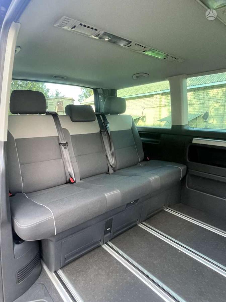 Black Volkswagen Multivan 2010 in Kaunas, with an engine capacity of 1.97 L and mileage of 276 thousand km for 9990 €, photo 22 on AUTOMOTO.COM.LV