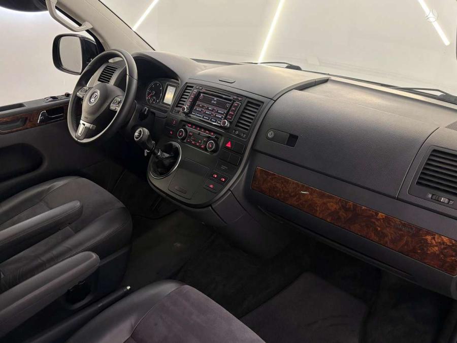 Black Volkswagen Multivan 2011 in Marijampole, with an engine capacity of 1.97 L and mileage of 213 thousand km for 14350 €, photo 5 on AUTOMOTO.COM.LV
