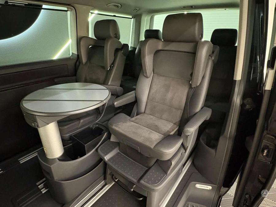 Black Volkswagen Multivan 2011 in Marijampole, with an engine capacity of 1.97 L and mileage of 213 thousand km for 14350 €, photo 6 on AUTOMOTO.COM.LV
