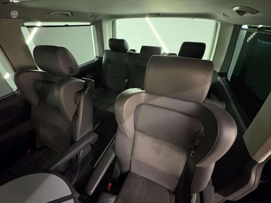 Black Volkswagen Multivan 2011 in Marijampole, with an engine capacity of 1.97 L and mileage of 213 thousand km for 14350 €, photo 8 on AUTOMOTO.COM.LV
