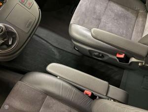 Black Volkswagen Multivan 2011 in Marijampole, with an engine capacity of 1.97 L and mileage of 213 thousand km for 14350 €, photo 10 on AUTOMOTO.COM.LV