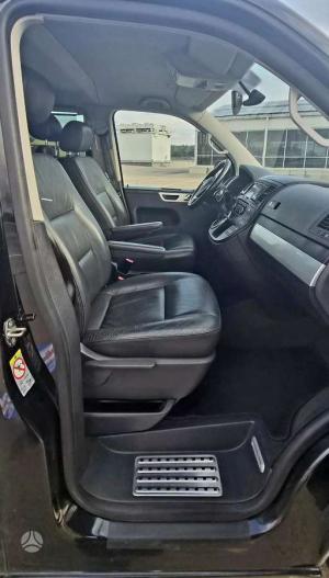 Black Volkswagen Multivan 2011 in Vilnius, with an engine capacity of 2.00 L and mileage of 199 thousand km for 14950 €, photo 22 on AUTOMOTO.COM.LV