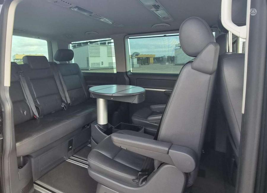 Black Volkswagen Multivan 2011 in Vilnius, with an engine capacity of 2.00 L and mileage of 199 thousand km for 14950 €, photo 28 on AUTOMOTO.COM.LV