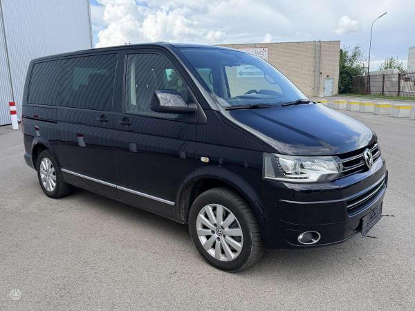 Melns Volkswagen Multivan 2012 Marijampole, ar dzinēja tilpumu 2.00 L un nobraukumu 293 tūkst. km par 12450 €, foto 3 vietnē AUTOMOTO.COM.LV