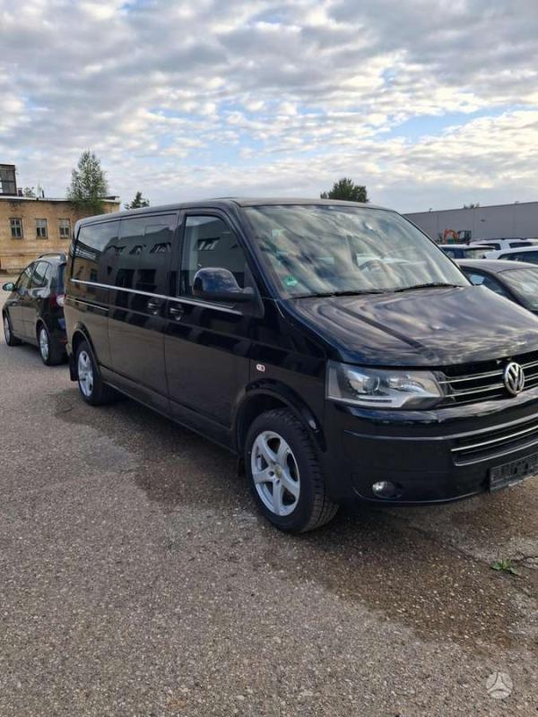 Black Volkswagen Multivan 2013 in Rokiskis, with an engine capacity of 2.00 L and mileage of 171 thousand km for 16600 €, photo 3 on AUTOMOTO.COM.LV