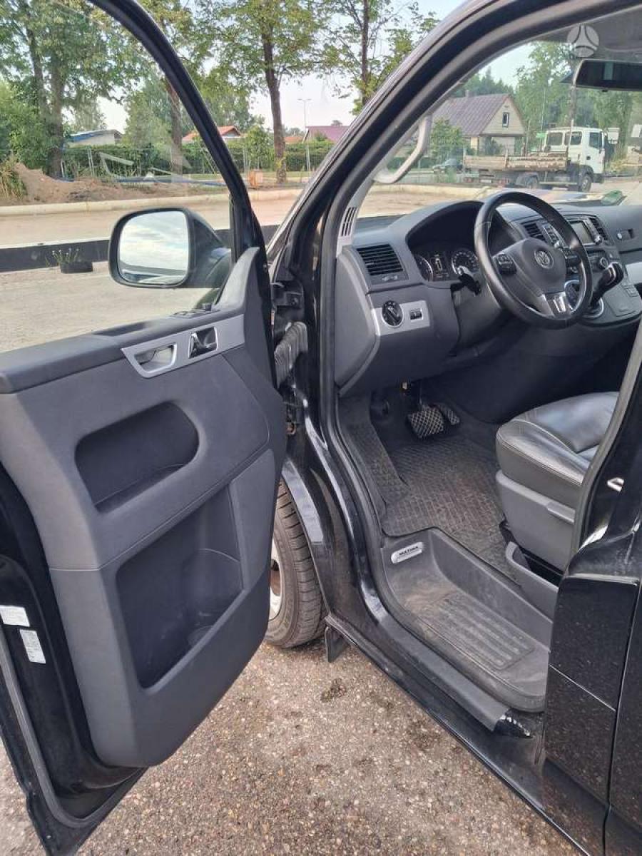Melns Volkswagen Multivan 2013 Rokiškis, ar dzinēja tilpumu 2.00 L un nobraukumu 171 tūkst. km par 16600 €, foto 18 vietnē AUTOMOTO.COM.LV