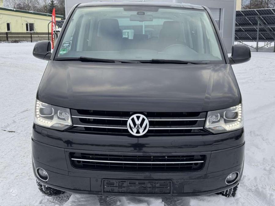 Melns Volkswagen Multivan 2015 Prienai, ar dzinēja tilpumu 2.00 L un nobraukumu 289 tūkst. km par 16100 €, foto 2 vietnē AUTOMOTO.COM.LV