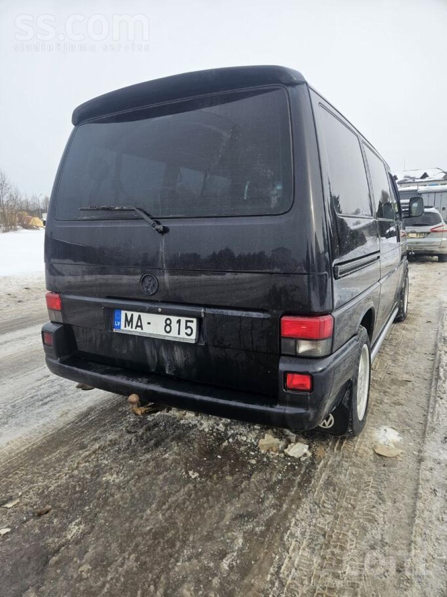 Black Volkswagen Multivan 2002 in Liepaja, with an engine capacity of 2.50 L and mileage of 412 thousand km for 4000 €, photo 3 on AUTOMOTO.COM.LV