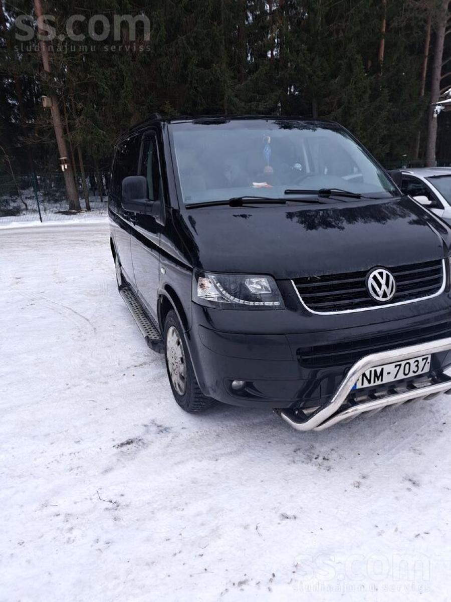 Black Volkswagen Multivan 2008 in Riga, with an engine capacity of 1.90 L and mileage of 243 thousand km for 10000 €, photo 3 on AUTOMOTO.COM.LV