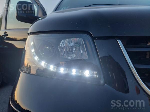 Melns Volkswagen Multivan 2008 Rīga, ar dzinēja tilpumu 1.90 L un nobraukumu 243 tūkst. km par 10000 €, foto 6 vietnē AUTOMOTO.COM.LV