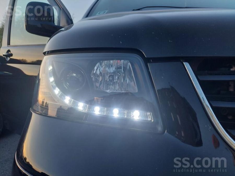 Black Volkswagen Multivan 2008 in Riga, with an engine capacity of 1.90 L and mileage of 243 thousand km for 10000 €, photo 7 on AUTOMOTO.COM.LV