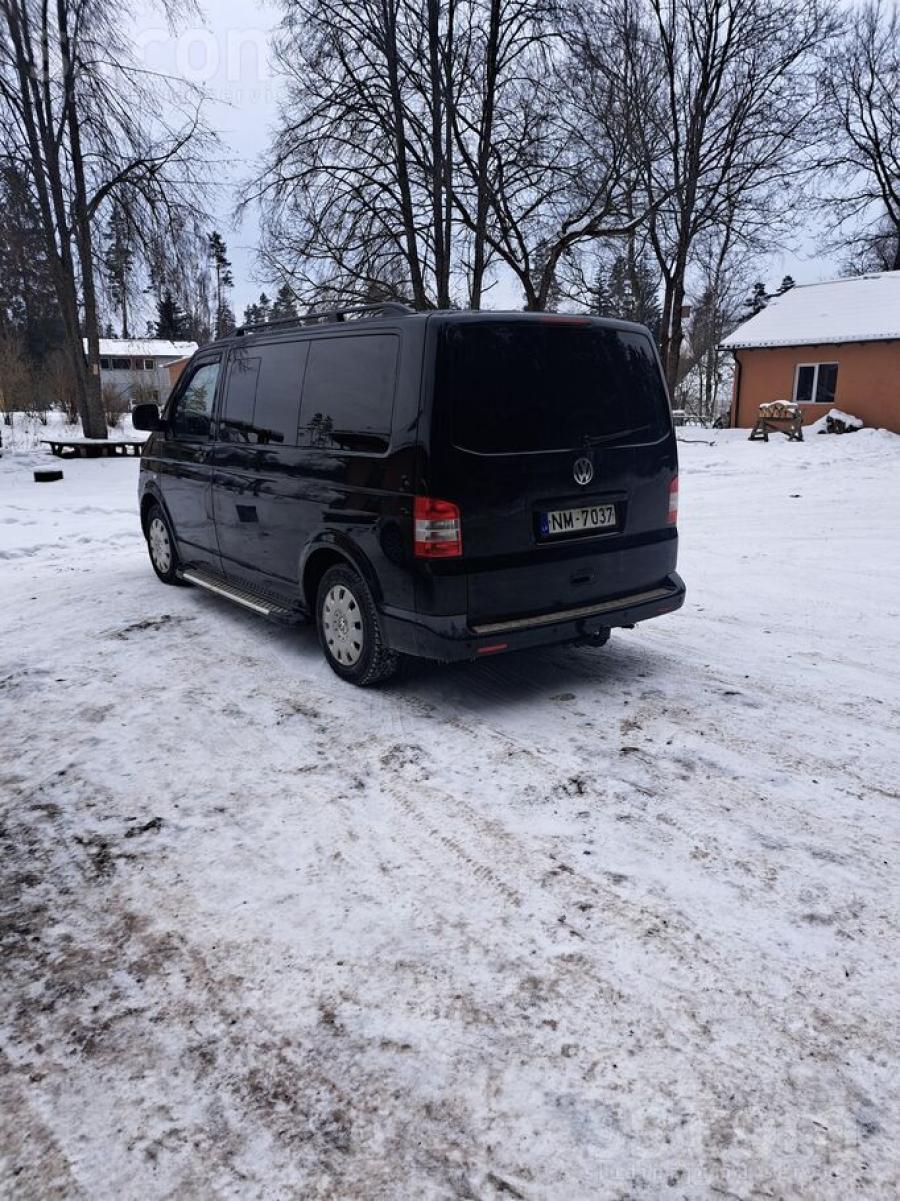 Black Volkswagen Multivan 2008 in Riga, with an engine capacity of 1.90 L and mileage of 243 thousand km for 10000 €, photo 8 on AUTOMOTO.COM.LV