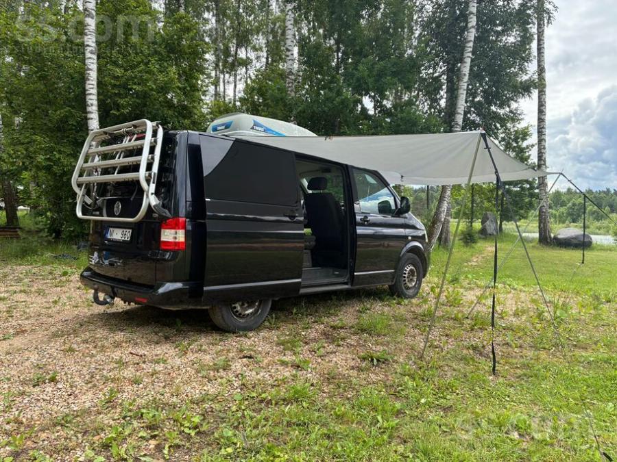 Black Volkswagen Multivan 2008 in Ogre, with an engine capacity of 2.50 L and mileage of 385 thousand km for 8950 €, photo 1 on AUTOMOTO.COM.LV
