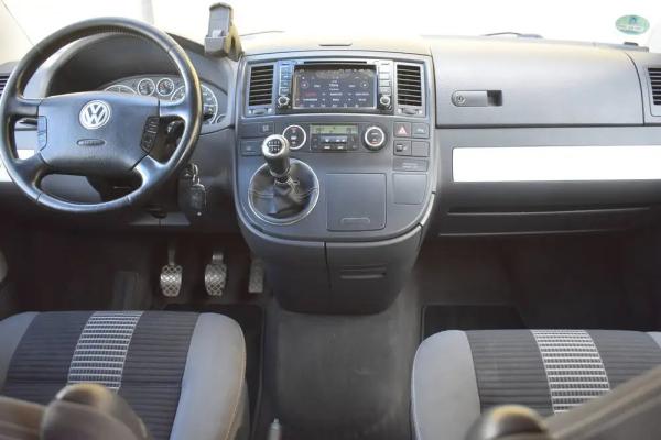 Black Volkswagen Multivan 2009 in Talsi, with an engine capacity of 2.50 L and mileage of 315 thousand km for 10800 €, photo 7 on AUTOMOTO.COM.LV