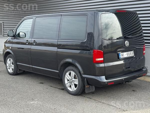 Black Volkswagen Multivan 2010 in Riga, with an engine capacity of 2.00 L and mileage of 228 thousand km for 16900 €, photo 3 on AUTOMOTO.COM.LV
