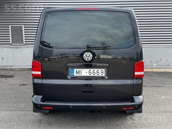 Black Volkswagen Multivan 2010 in Riga, with an engine capacity of 2.00 L and mileage of 228 thousand km for 16900 €, photo 4 on AUTOMOTO.COM.LV