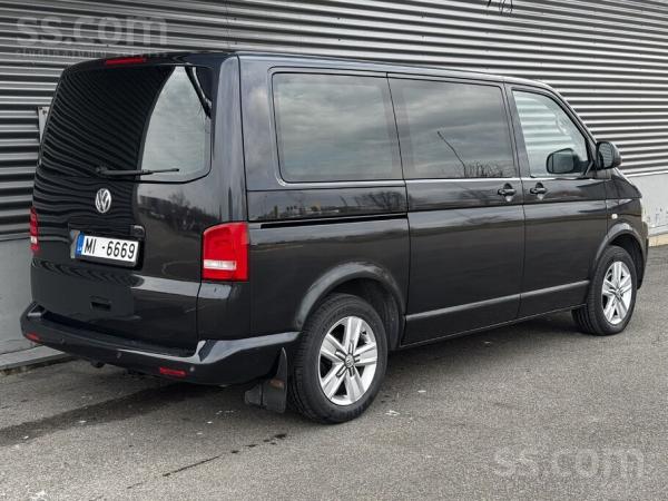 Black Volkswagen Multivan 2010 in Riga, with an engine capacity of 2.00 L and mileage of 228 thousand km for 16900 €, photo 5 on AUTOMOTO.COM.LV