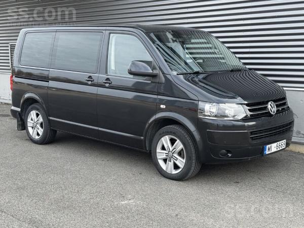 Black Volkswagen Multivan 2010 in Riga, with an engine capacity of 2.00 L and mileage of 228 thousand km for 16900 €, photo 7 on AUTOMOTO.COM.LV