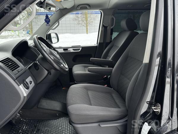 Black Volkswagen Multivan 2010 in Riga, with an engine capacity of 2.00 L and mileage of 228 thousand km for 16900 €, photo 8 on AUTOMOTO.COM.LV