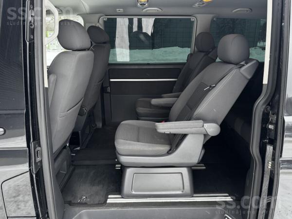 Black Volkswagen Multivan 2010 in Riga, with an engine capacity of 2.00 L and mileage of 228 thousand km for 16900 €, photo 9 on AUTOMOTO.COM.LV