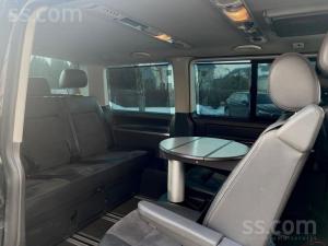 Melns Volkswagen Multivan 2010 Jelgava, ar dzinēja tilpumu 2.00 L un nobraukumu 330 tūkst. km par 14995 €, foto 12 vietnē AUTOMOTO.COM.LV