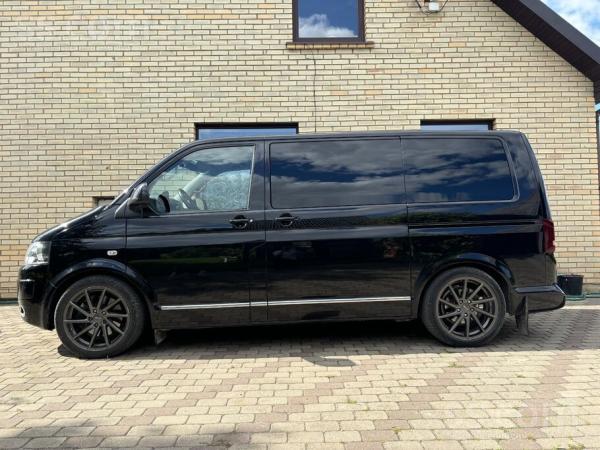 Black Volkswagen Multivan 2010 in Bauska, with an engine capacity of 2.00 L and mileage of 212 thousand km for 12500 €, photo 3 on AUTOMOTO.COM.LV