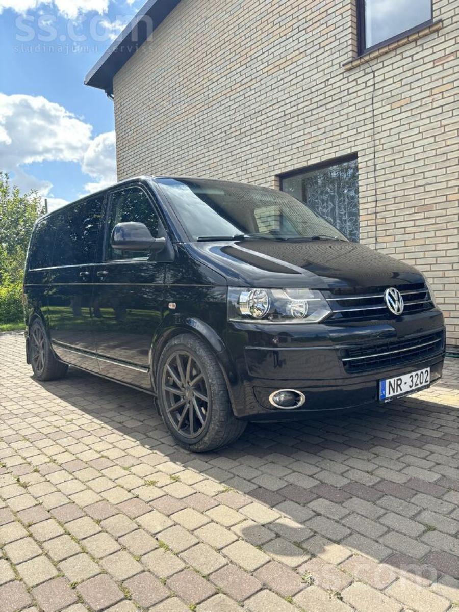 Black Volkswagen Multivan 2010 in Bauska, with an engine capacity of 2.00 L and mileage of 212 thousand km for 12500 €, photo 7 on AUTOMOTO.COM.LV