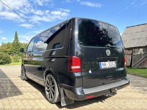 Black Volkswagen Multivan 2010 in Bauska, with an engine capacity of 2.00 L and mileage of 212 thousand km for 12500 €, photo 11 on AUTOMOTO.COM.LV
