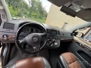 Black Volkswagen Multivan 2010 in Bauska, with an engine capacity of 2.00 L and mileage of 212 thousand km for 12500 €, photo 14 on AUTOMOTO.COM.LV