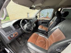 Black Volkswagen Multivan 2010 in Bauska, with an engine capacity of 2.00 L and mileage of 212 thousand km for 12500 €, photo 15 on AUTOMOTO.COM.LV