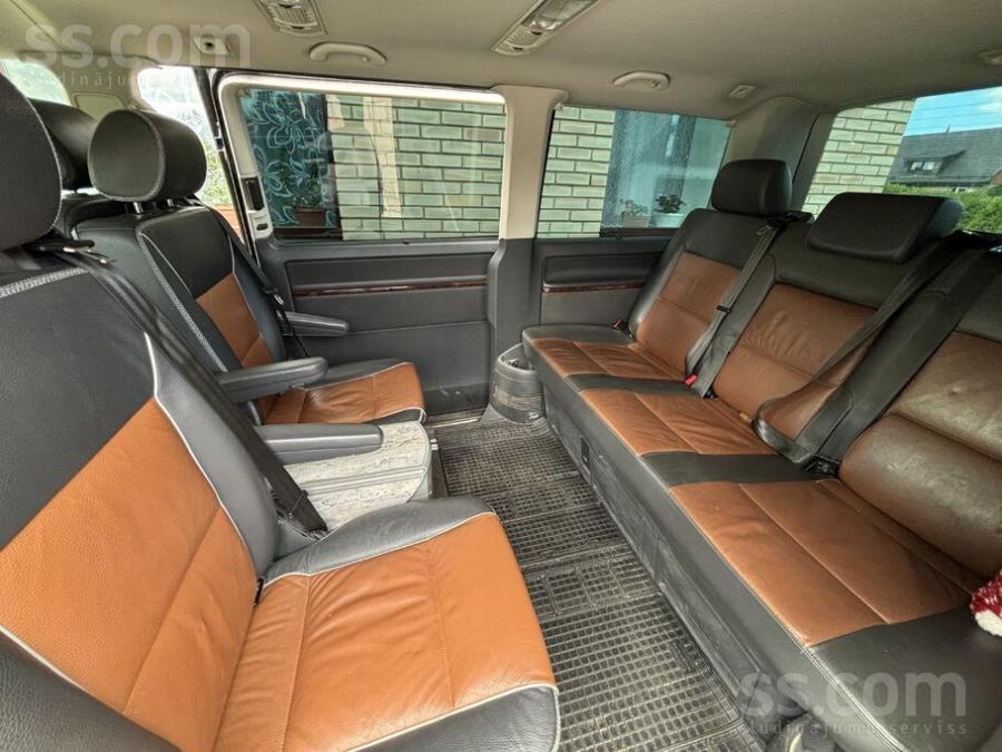 Black Volkswagen Multivan 2010 in Bauska, with an engine capacity of 2.00 L and mileage of 212 thousand km for 12500 €, photo 16 on AUTOMOTO.COM.LV