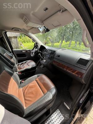 Black Volkswagen Multivan 2010 in Bauska, with an engine capacity of 2.00 L and mileage of 212 thousand km for 12500 €, photo 19 on AUTOMOTO.COM.LV